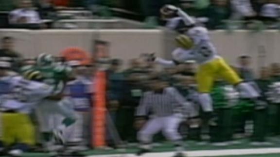 charles woodson first interception