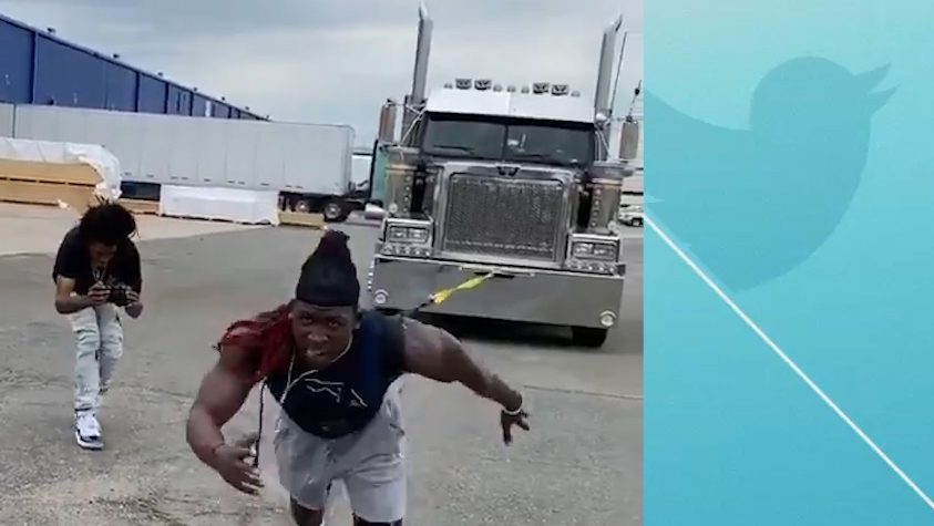 Football player shows off his strength by pulling a truck - Stream the ...