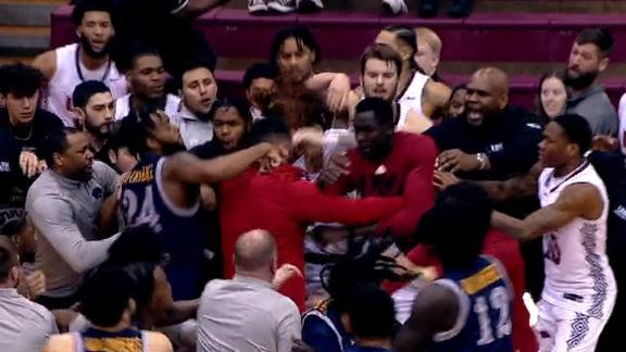 Brawl erupts in handshake line after college basketball game - ESPN Video