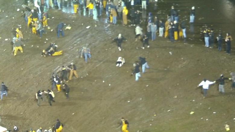 Mud slide! App State fans take scenic route to celebrate on field ...