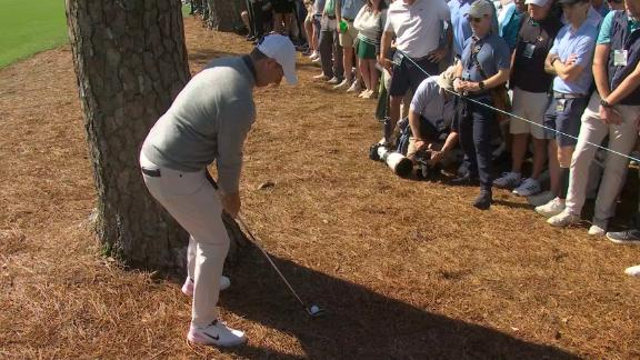 Rory makes makes birdie despite precarious position behind a tree ...